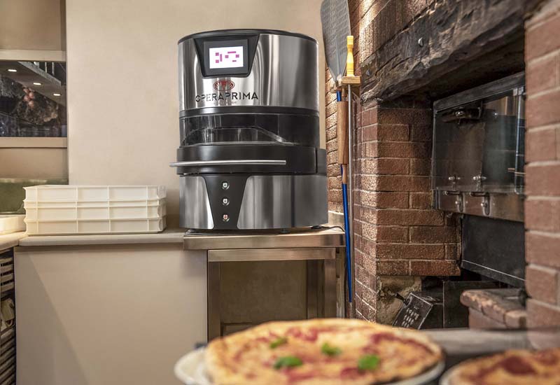 Prep machine takes the pain out of stretching dough for aching pizza chefs
